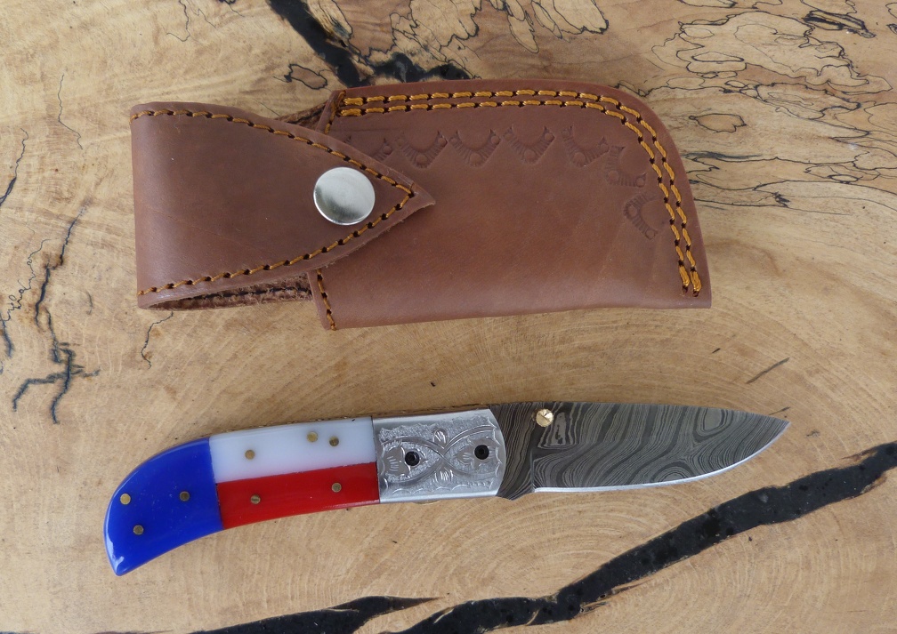 SharpPointyThings.com - Custom & Commercial Knives, Cloaks, and Costumes